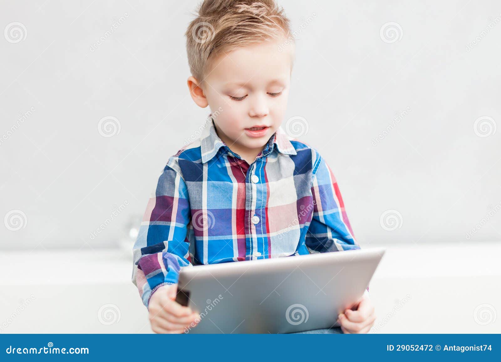 Boy with tablet pc stock photo. Image of online, education - 29052472