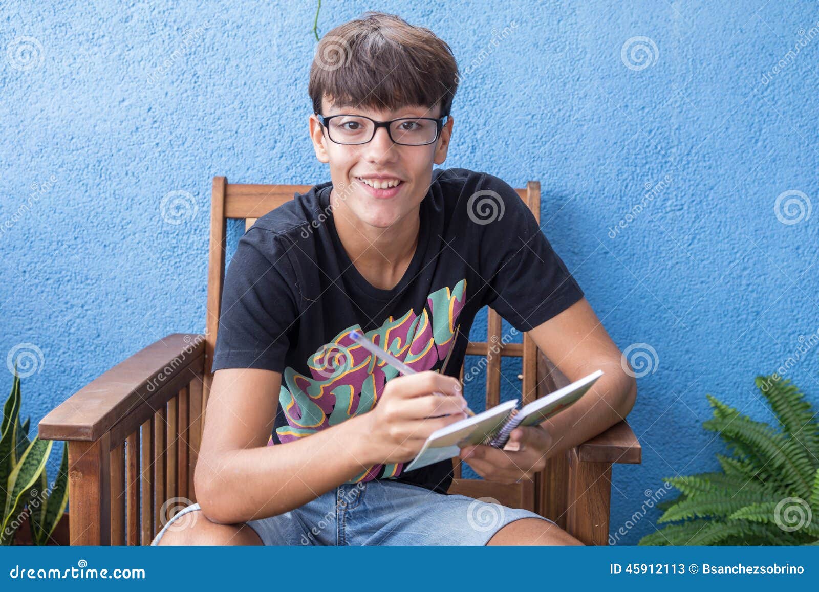 The Boy Takes Notes in Notepad Stock Image - Image of hair, european ...