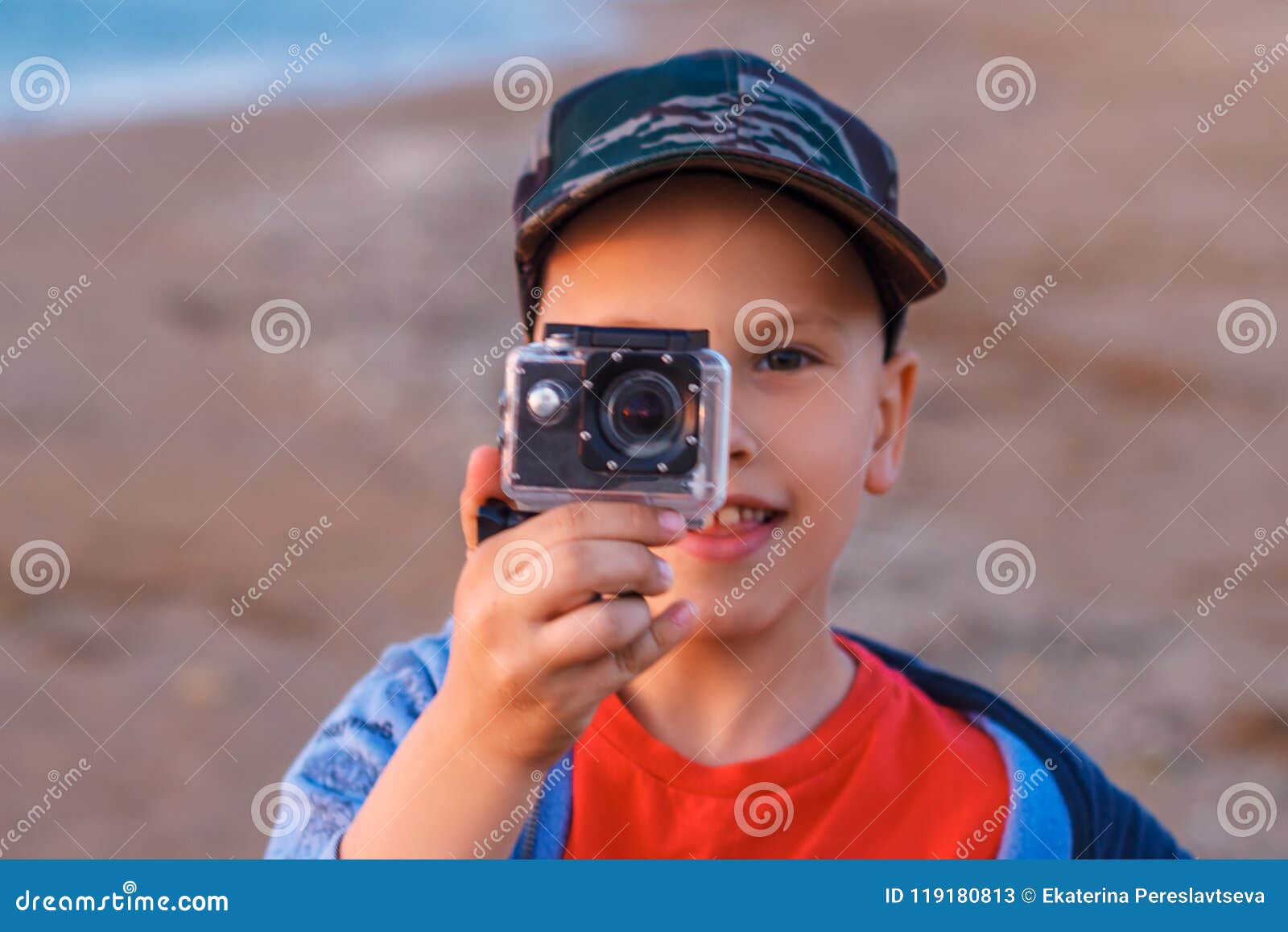 The Boy Takes Pictures on Action Camera Stock Image - Image of happy ...