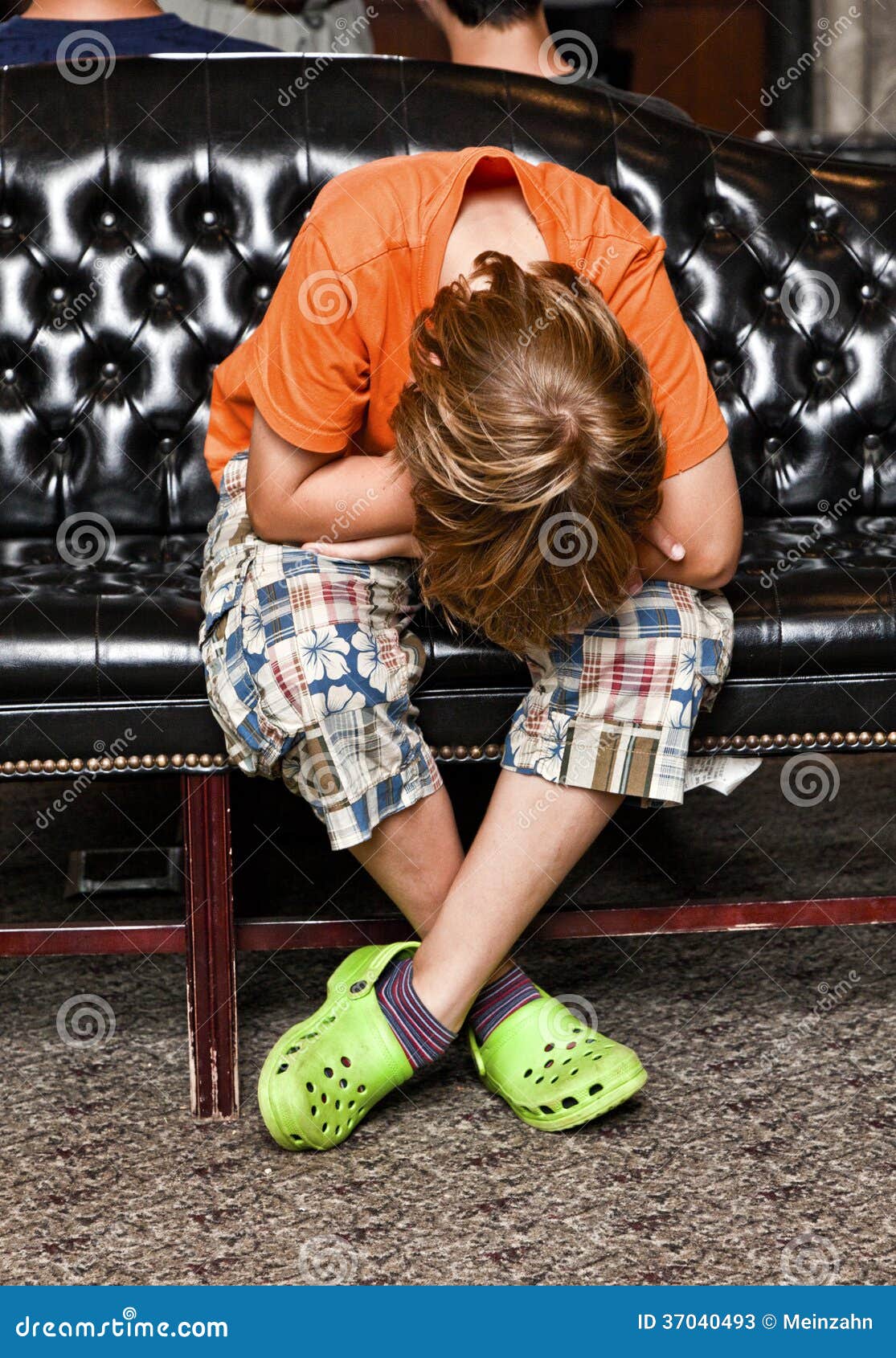 Boy takes a rest at a sofa stock image. Image of handsome - 37040493