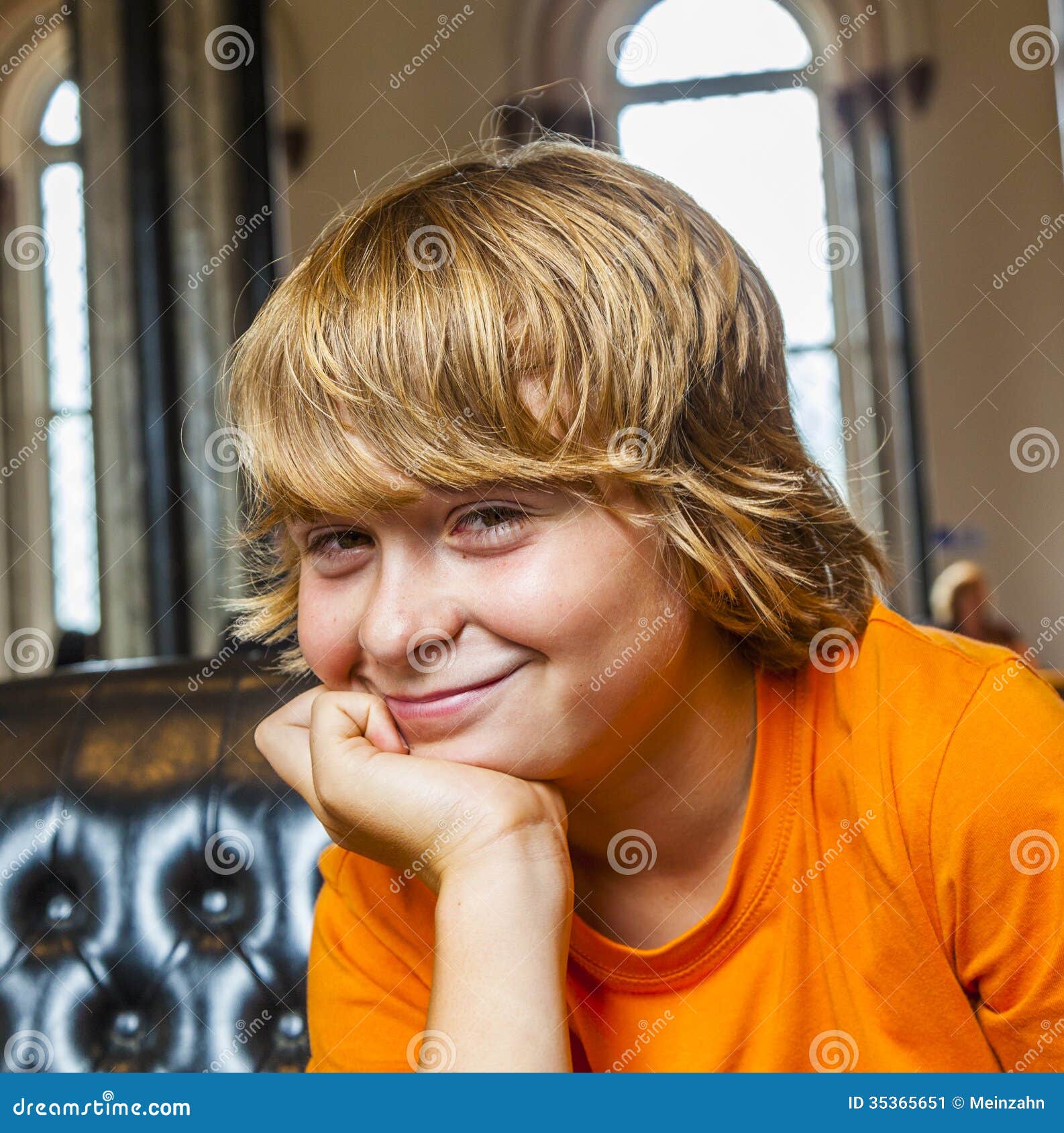 Boy takes a rest at a sofa stock image. Image of child - 35365651