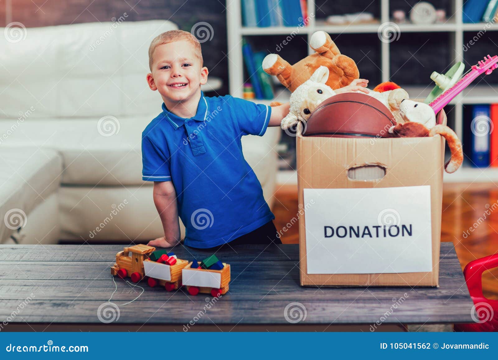 Boy Taking Donation Box Full with Stuff Stock Photo - Image of donate ...
