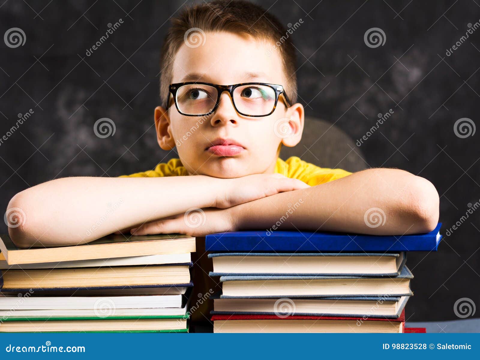 Boy Taking a Rest on Top of Books Stock Photo - Image of child, school ...