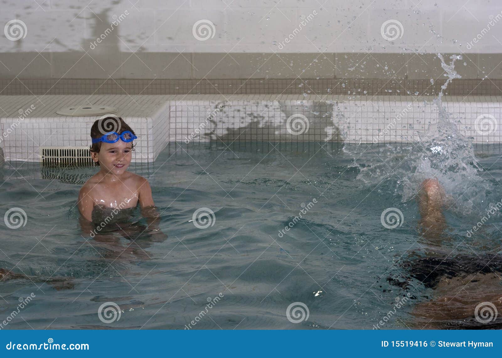 Boy taking a swim lesson stock photo. Image of lesson - 15519416