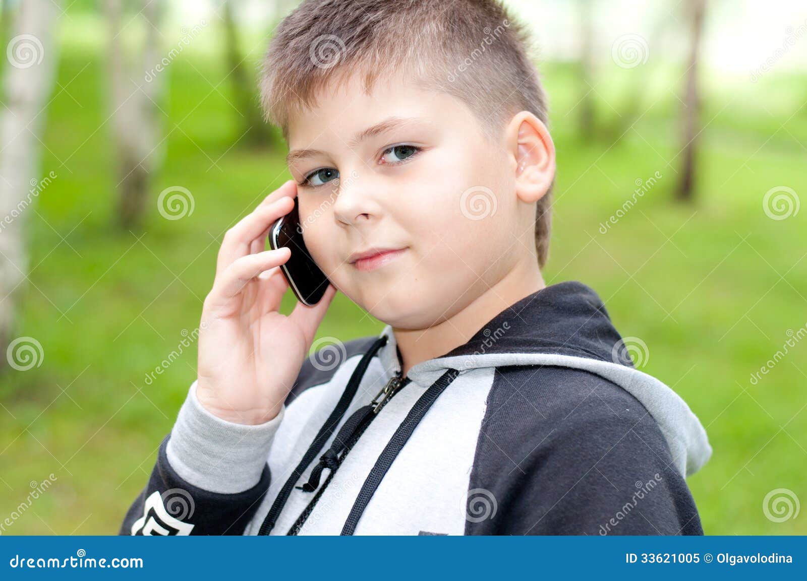Boy Talking on Cell Phone in the Park Stock Image - Image of year ...