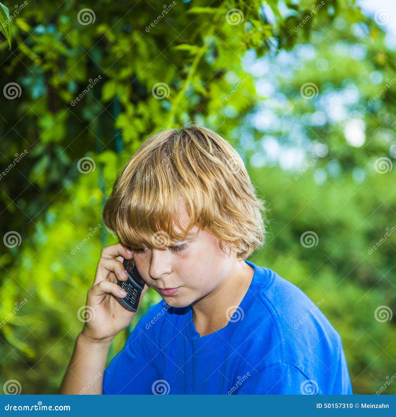 Boy Talking on a Cell Phone. Stock Photo - Image of discussion ...