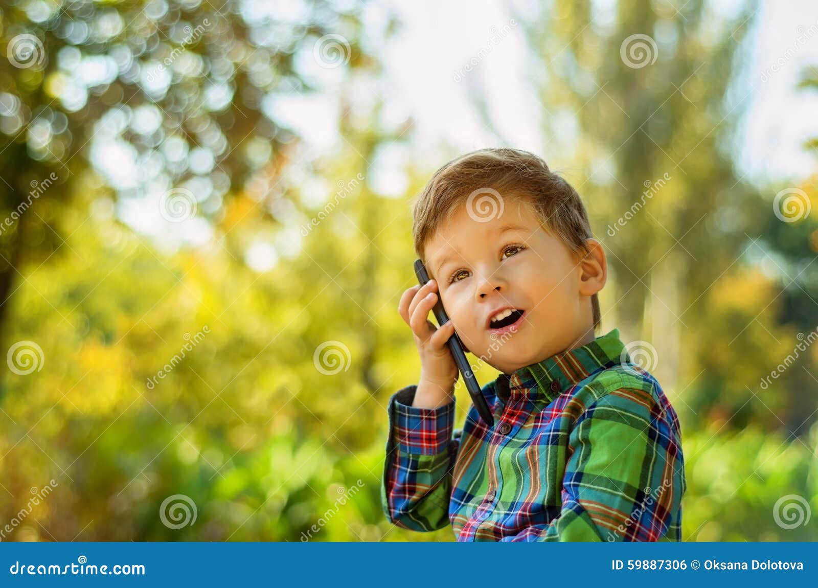 Boy Talking on Mobile Phone Stock Photo - Image of happiness, portrait ...