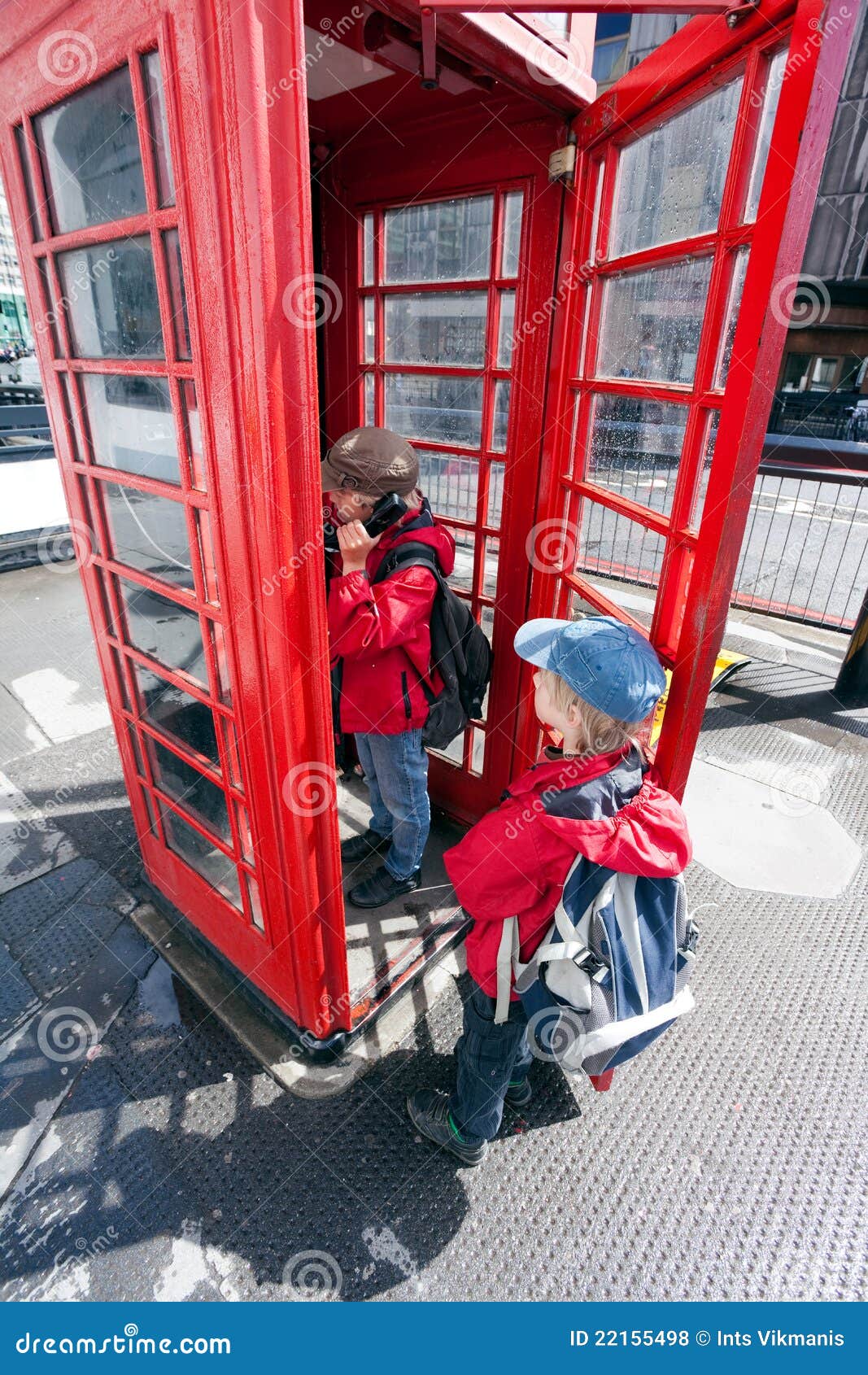 Boy Talking in Pay Phone Box Stock Photo - Image of city, payphone ...