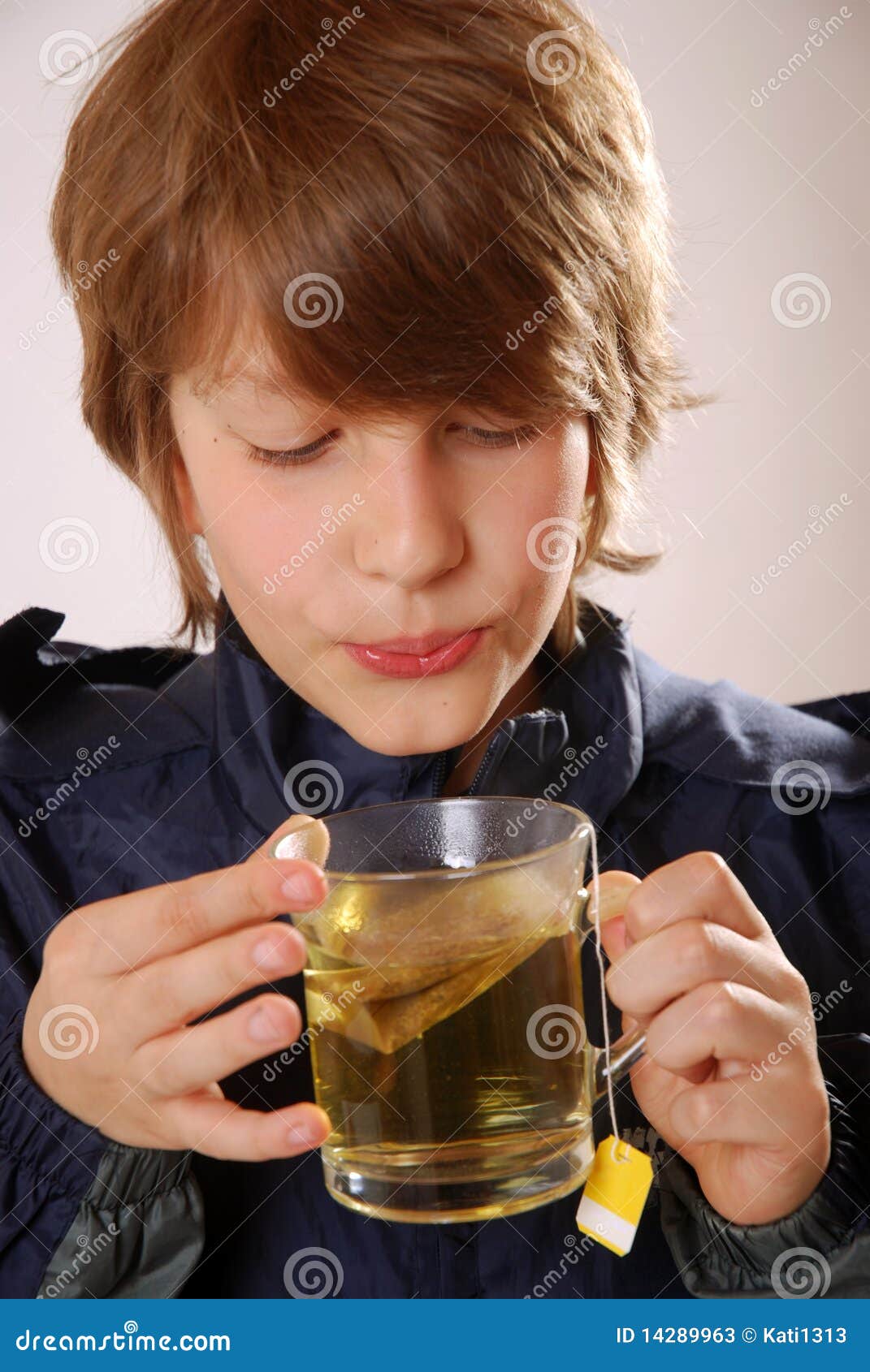 Boy with tea stock image. Image of 9years, cosiness, drinks - 14289963