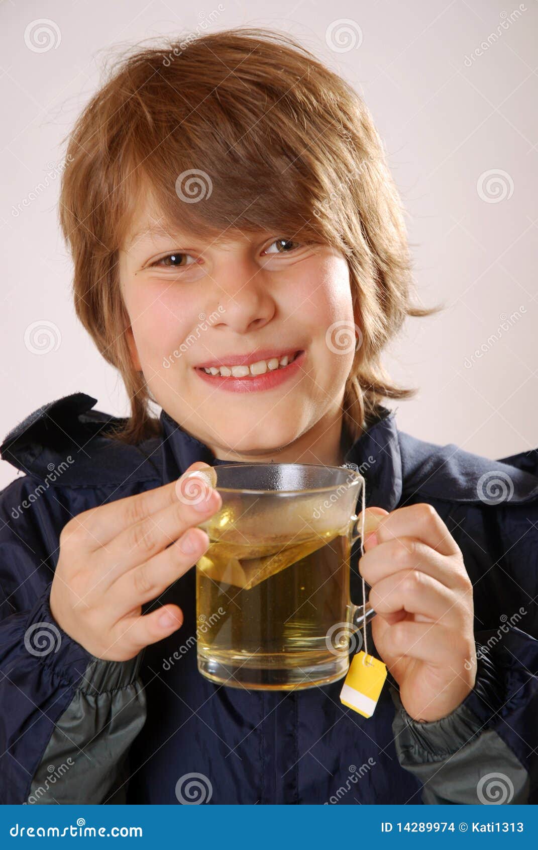 Boy with tea stock photo. Image of glass, hand, cheerful - 14289974