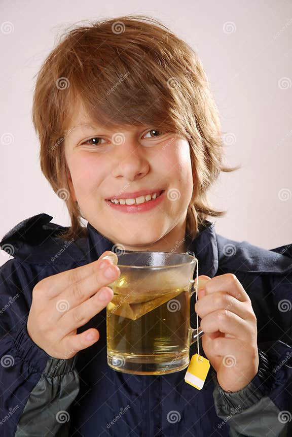 Boy with tea stock photo. Image of glass, hand, cheerful - 14289974