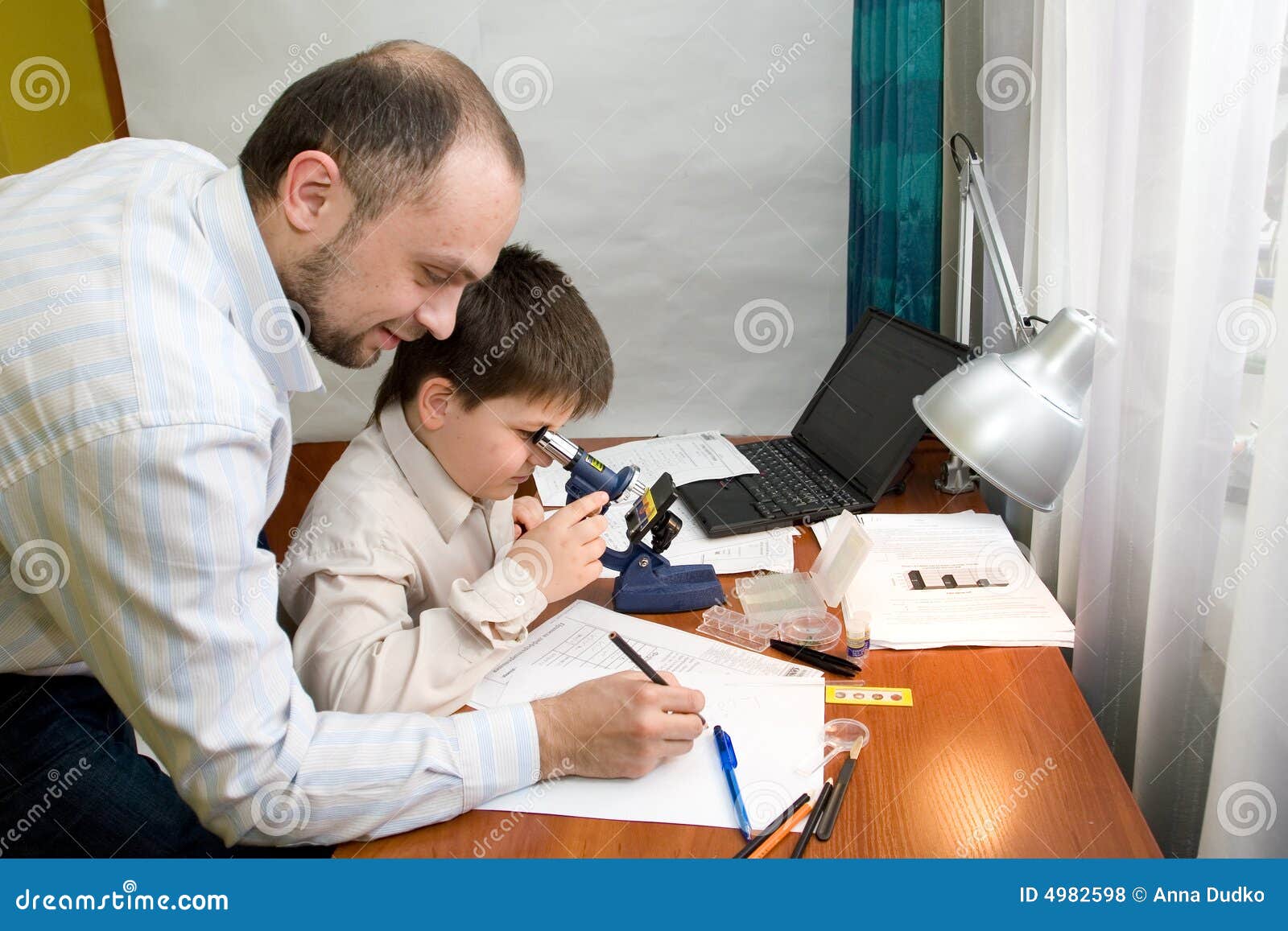 Boy with Teacher in the Laboratory Stock Photo - Image of chemistry ...