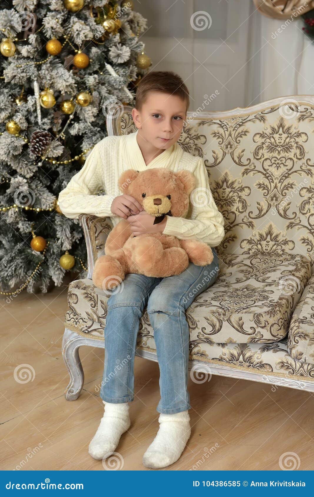 Boy with a Teddy Bear at a Christmas Tree Stock Image - Image of ...