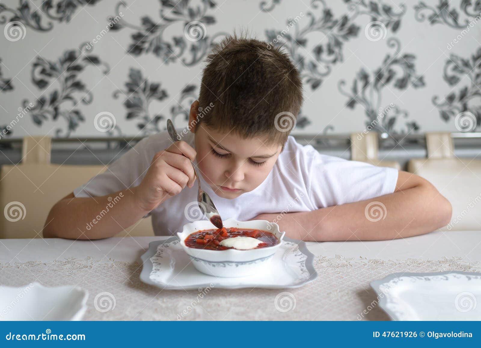 Boy Teenager Eating Soup at Kitchen Table Stock Photo - Image of male ...