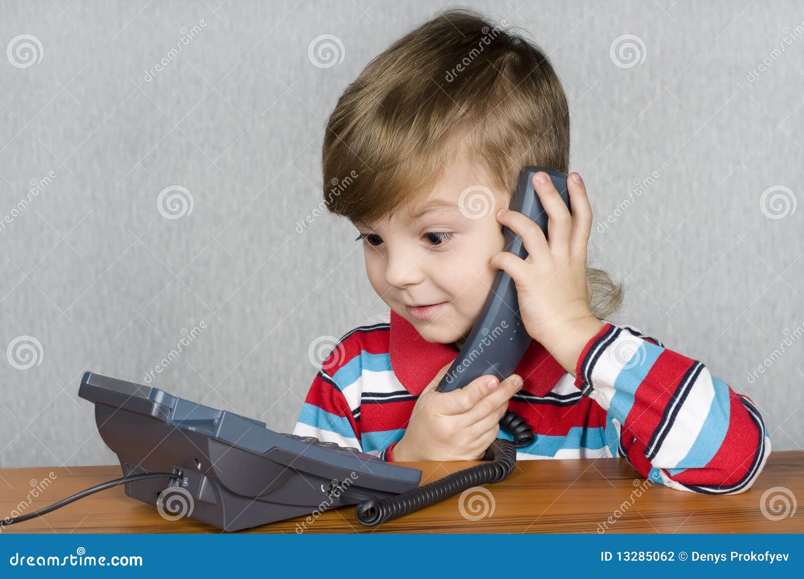 Boy with telephone stock photo. Image of communicate - 13285062