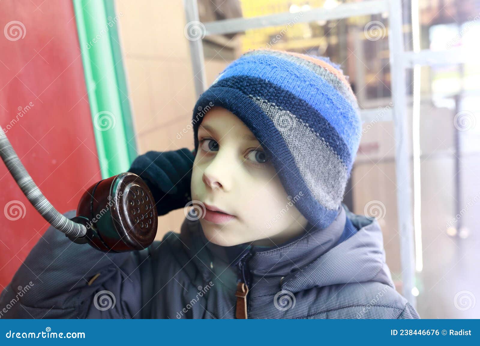 Boy in Telephone Booth with Phone Receiver Stock Photo - Image of talk ...