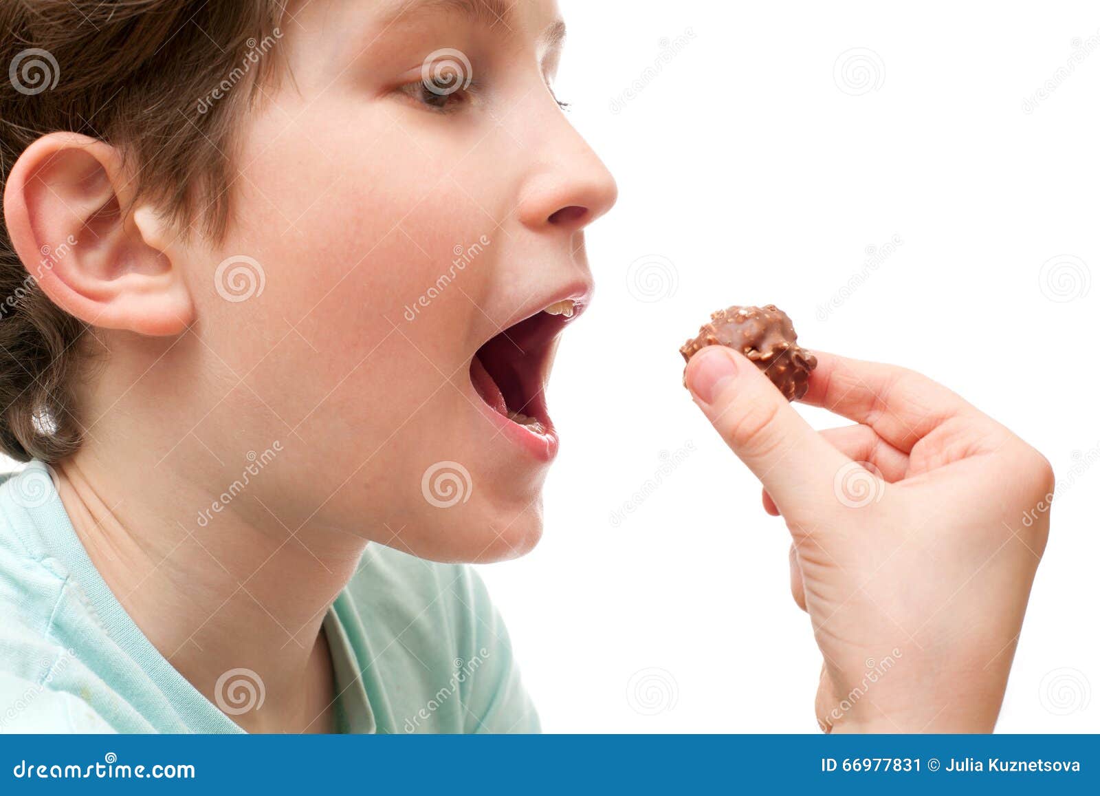 A Boy is Testing Chocolate Truffle Stock Image - Image of mouth ...