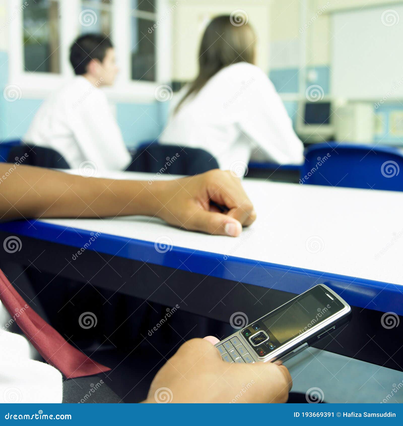 Boy Text Messaging in the Classroom. Conceptual Image Shot Stock Image ...