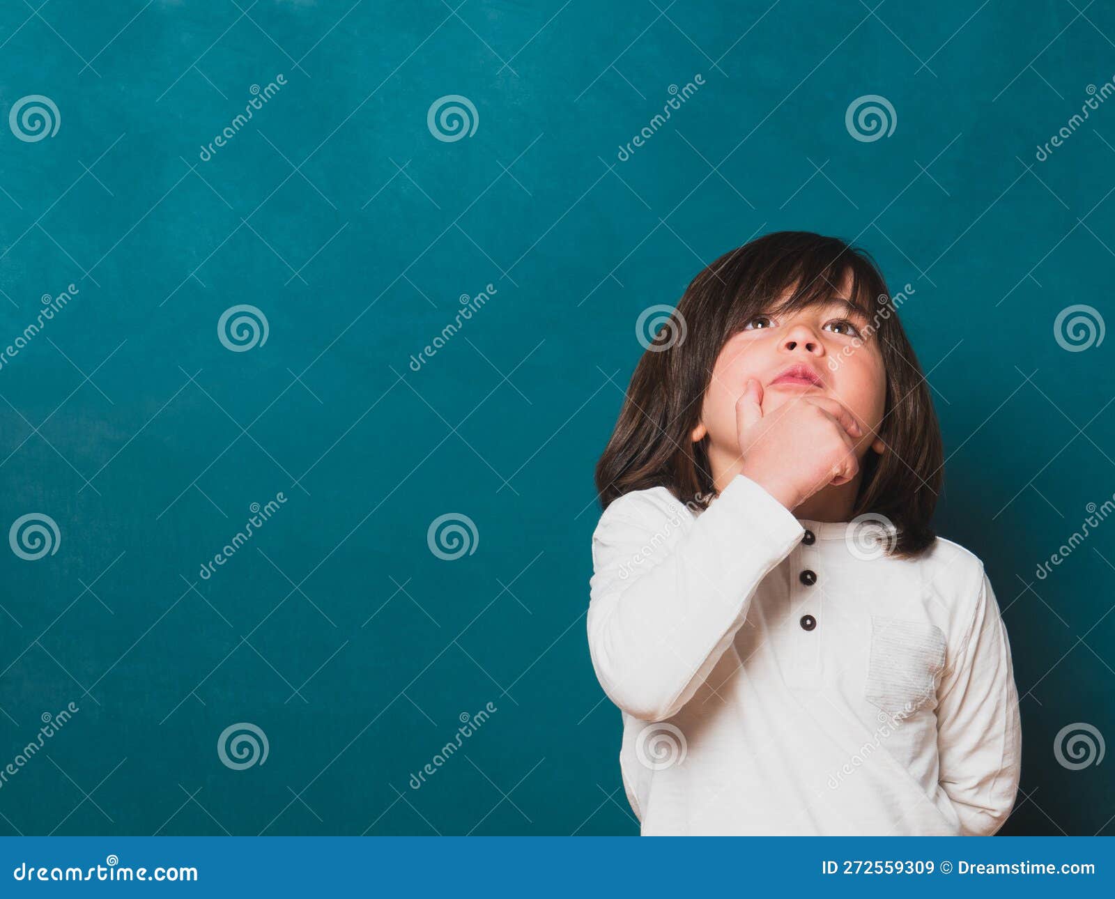 Boy Thinking in Front of the Classroom Blackboard. Stock Image - Image ...