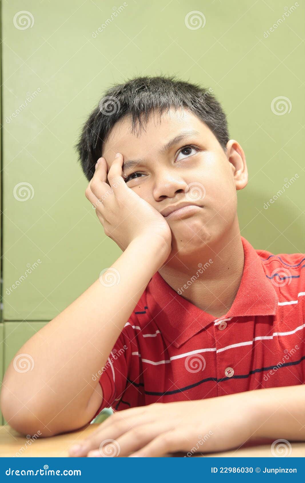 Boy Thinking/Wondering stock photo. Image of confusion - 22986030