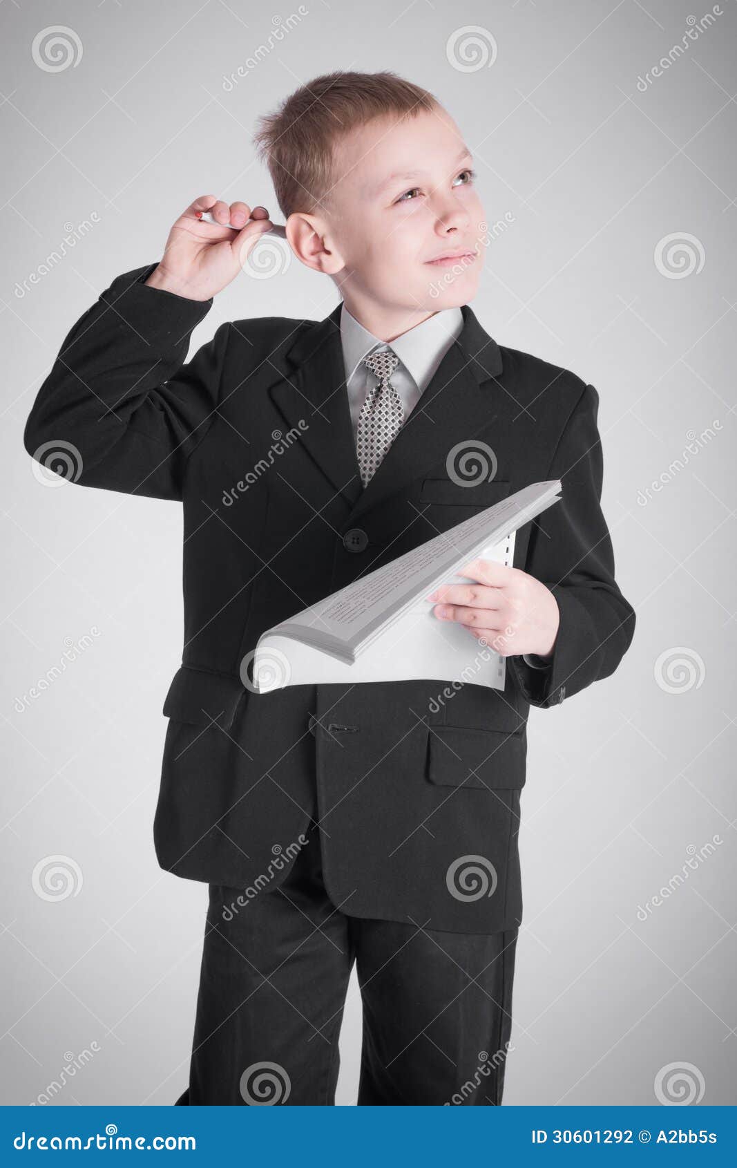 Boy with a thoughtful look stock photo. Image of think - 30601292
