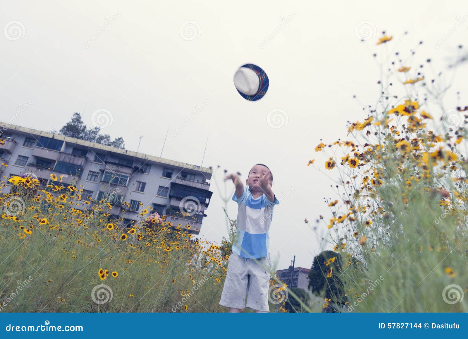 Boy throw hat stock photo. Image of chinese, countryside - 57827144