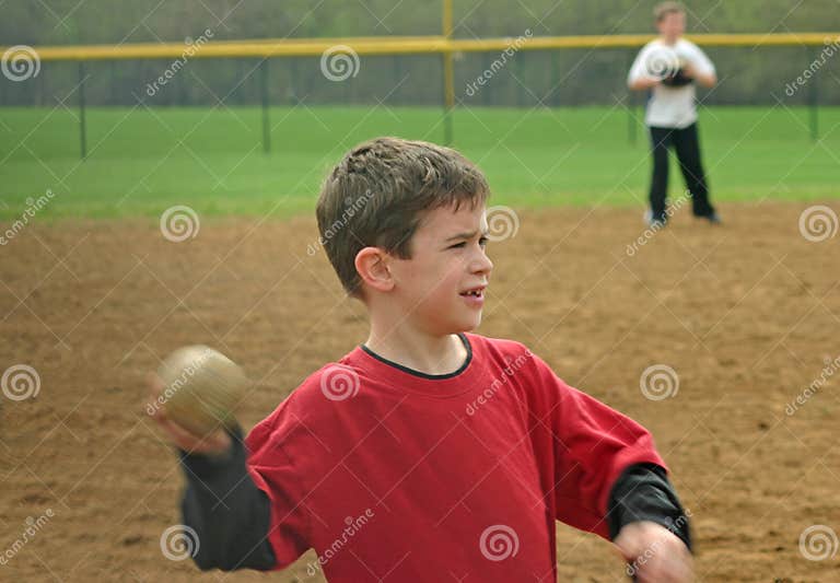 Boy Throwing Baseball stock image. Image of close, ball - 2248495