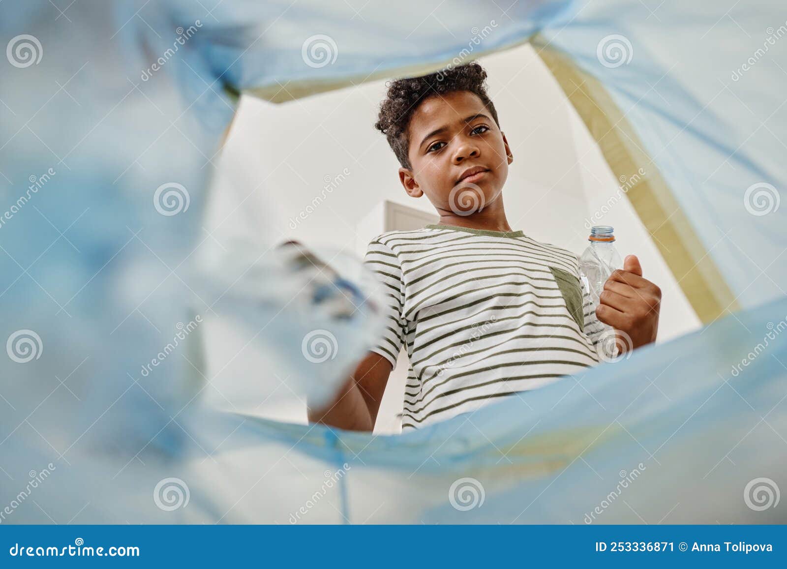 Boy Throwing Garbage in Trash Bin Stock Image - Image of container ...