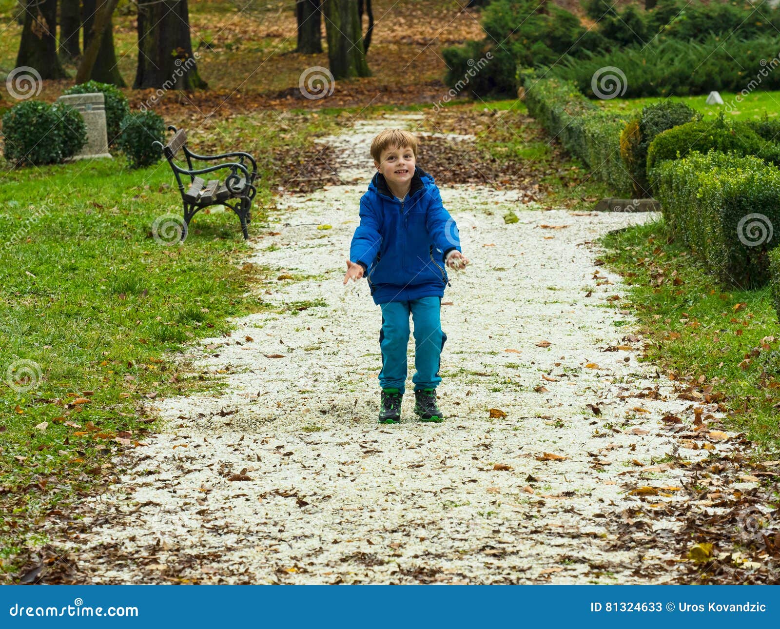 Boy throwing pebbles stock image. Image of park, play - 81324633