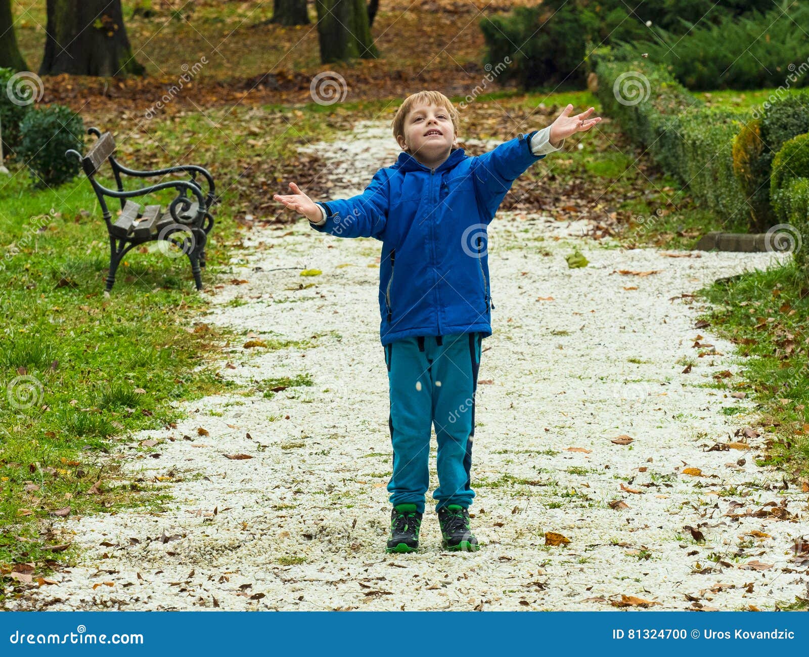 Boy throwing pebbles stock photo. Image of expression - 81324700