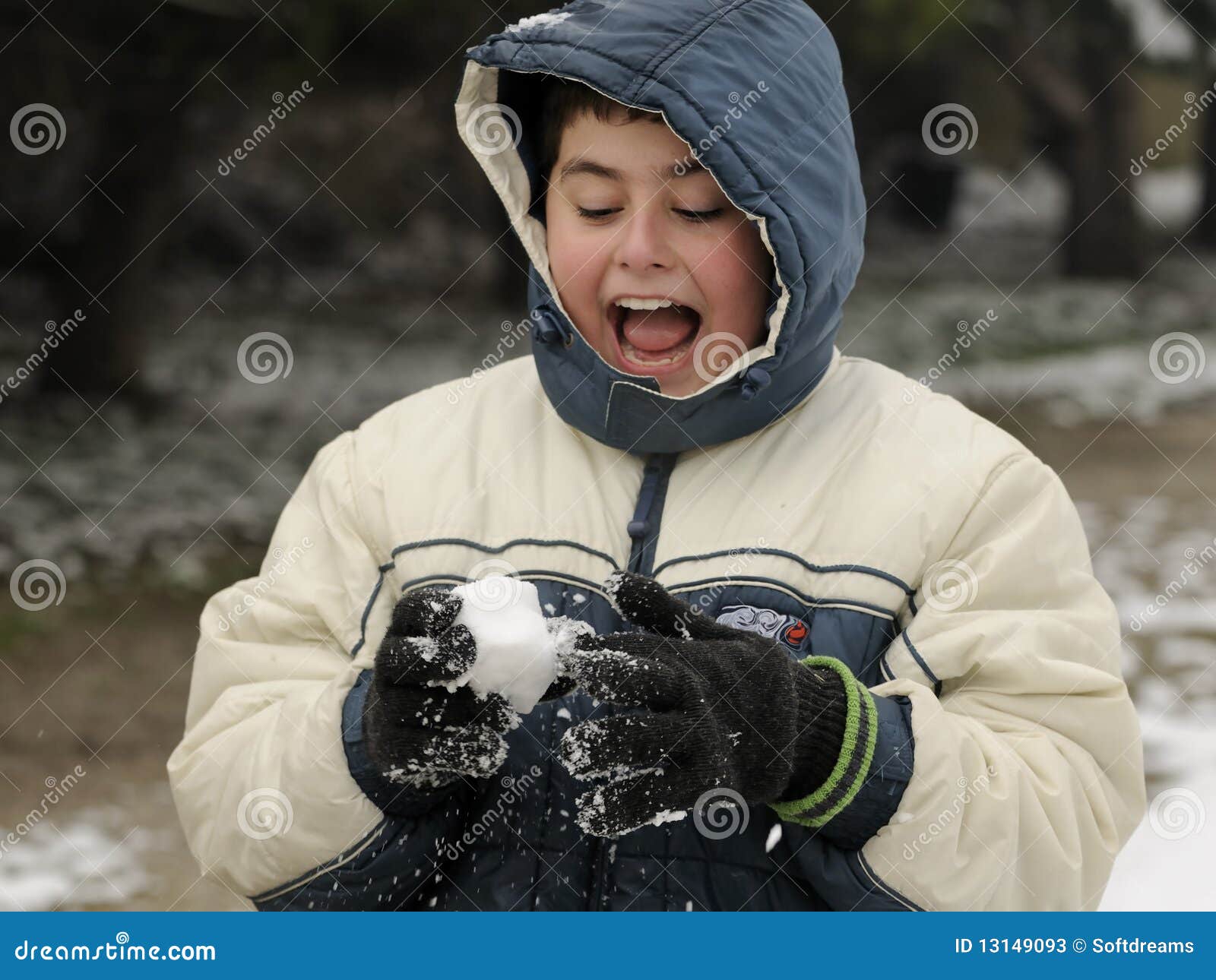 BOY THROWING a SNOWBALL stock image. Image of outdoors - 13149093