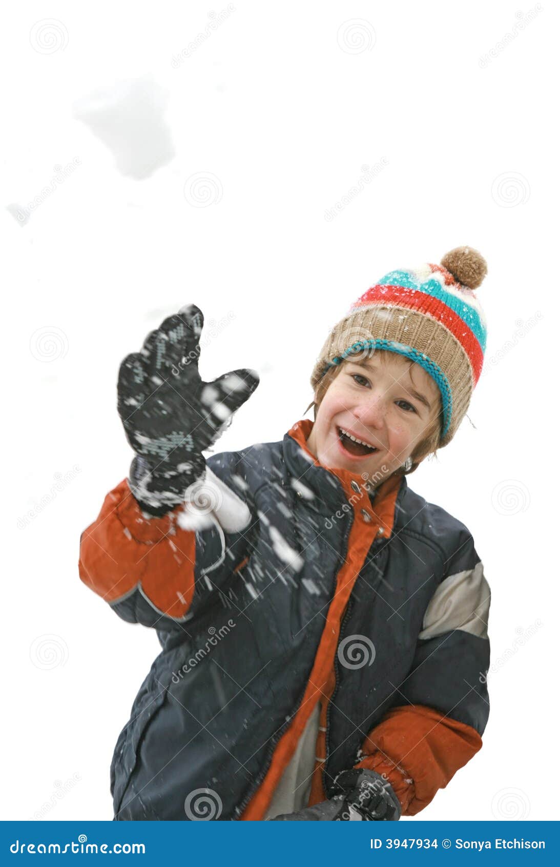 Boy Throwing a SnowBall stock photo. Image of laughing - 3947934