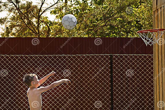 Boy Throws the Ball into the Ring Stock Image - Image of outside ...