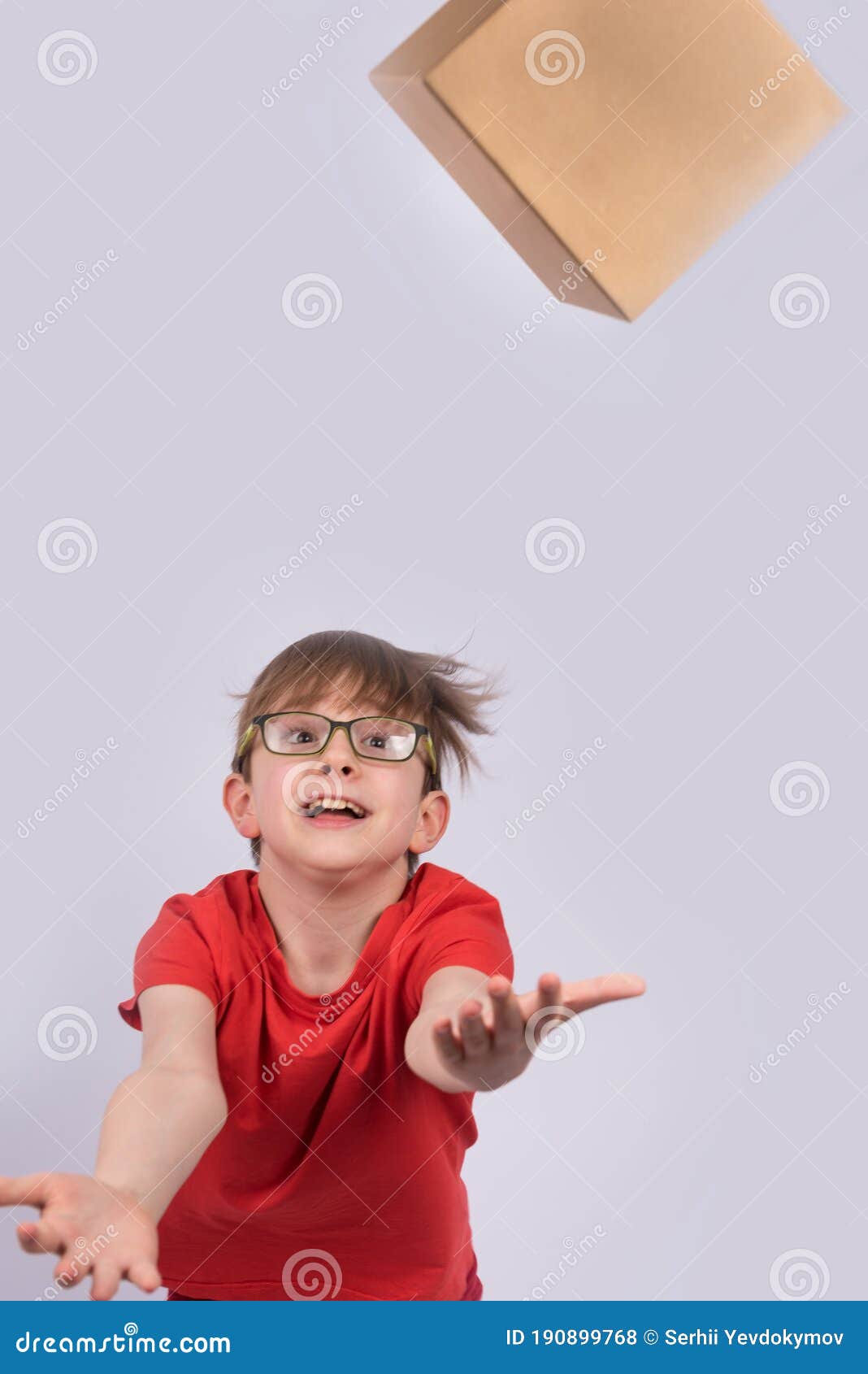 Boy Throws Box and Catches it. Photos in Motion Stock Photo - Image of ...