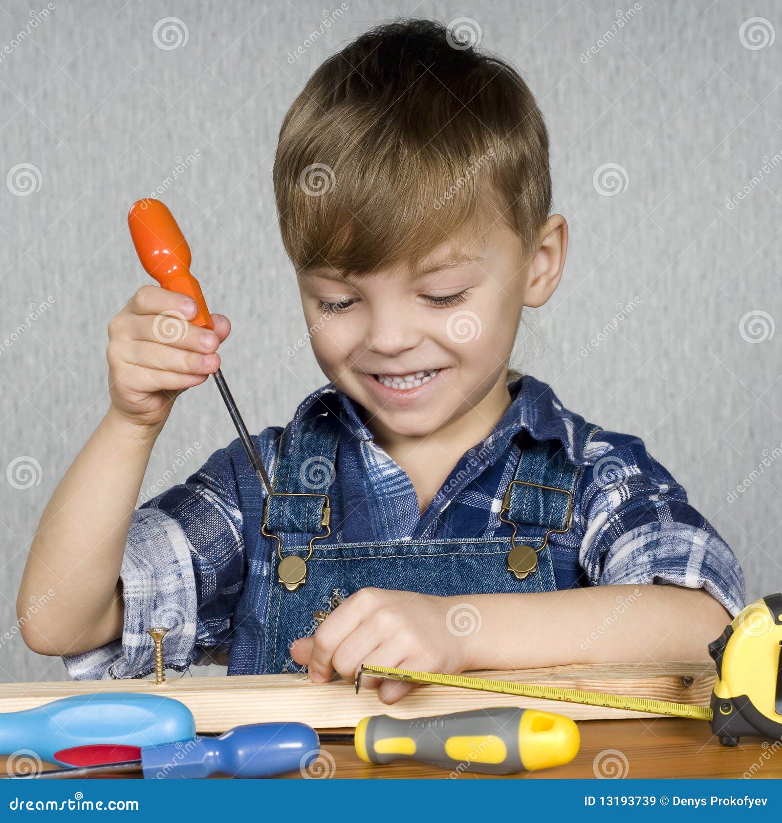 Boy with tools stock image. Image of equipment, pencil - 13193739