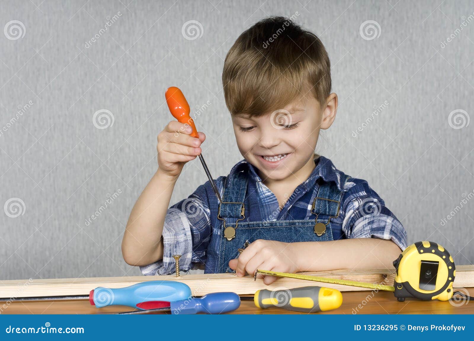 Boy with tools stock image. Image of childhood, cutting - 13236295
