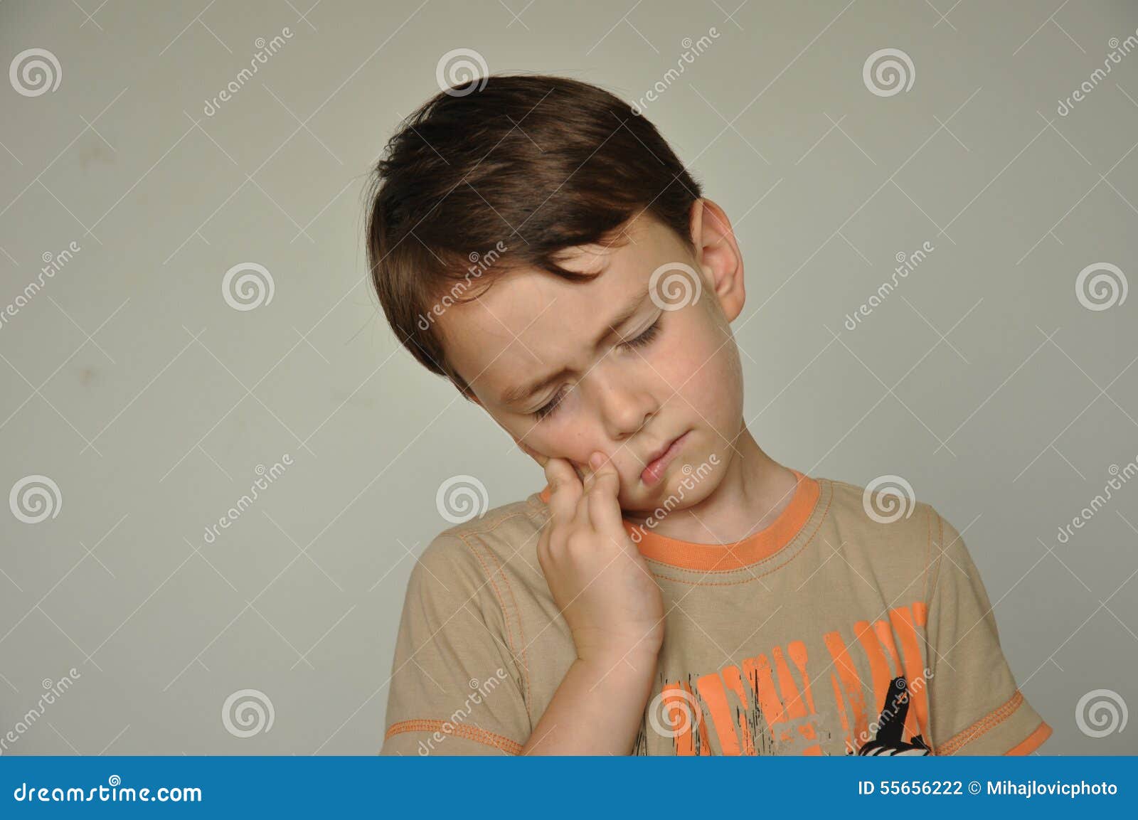 A boy with a toothache stock photo. Image of nose, years - 55656222