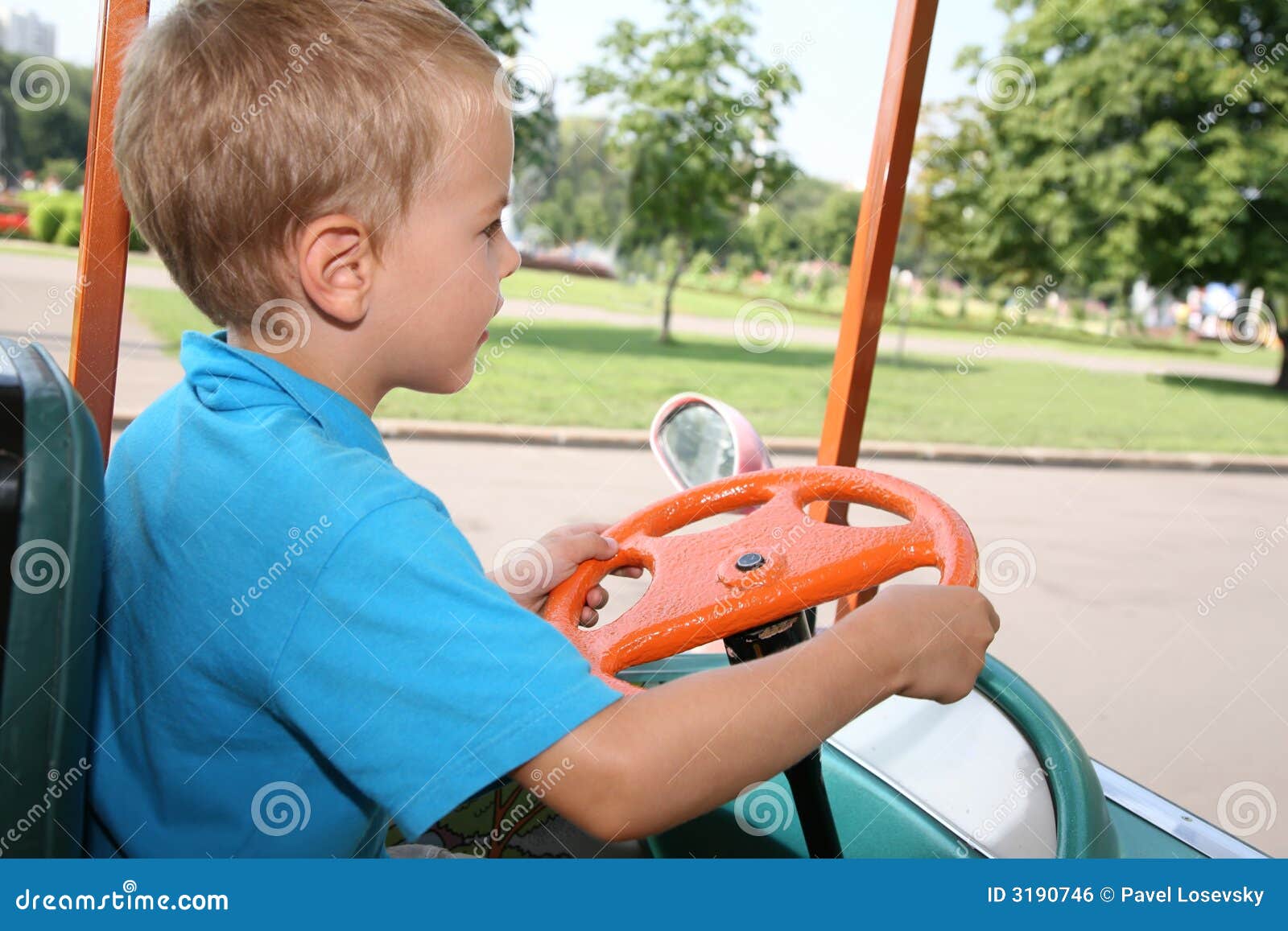 Boy in toy car stock photo. Image of merry, carousels - 3190746