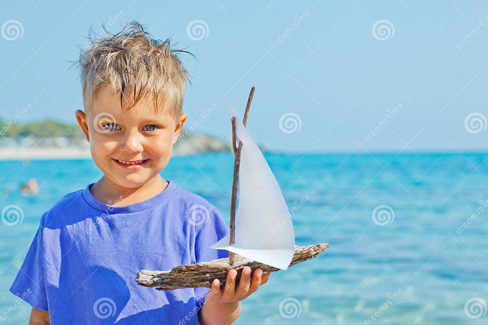 Boy with toy ship stock photo. Image of nature, model - 35111016