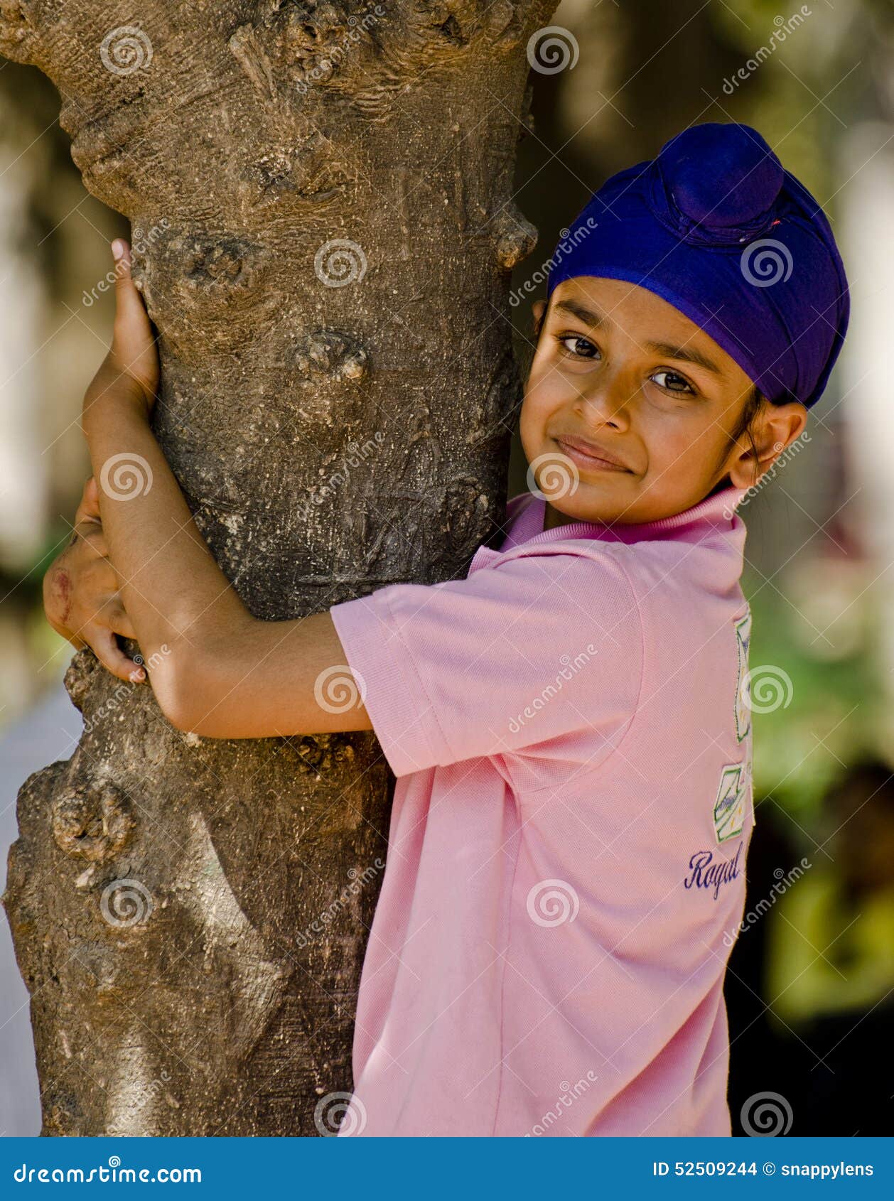 Boy with a tree stock photo. Image of garden, playing - 52509244