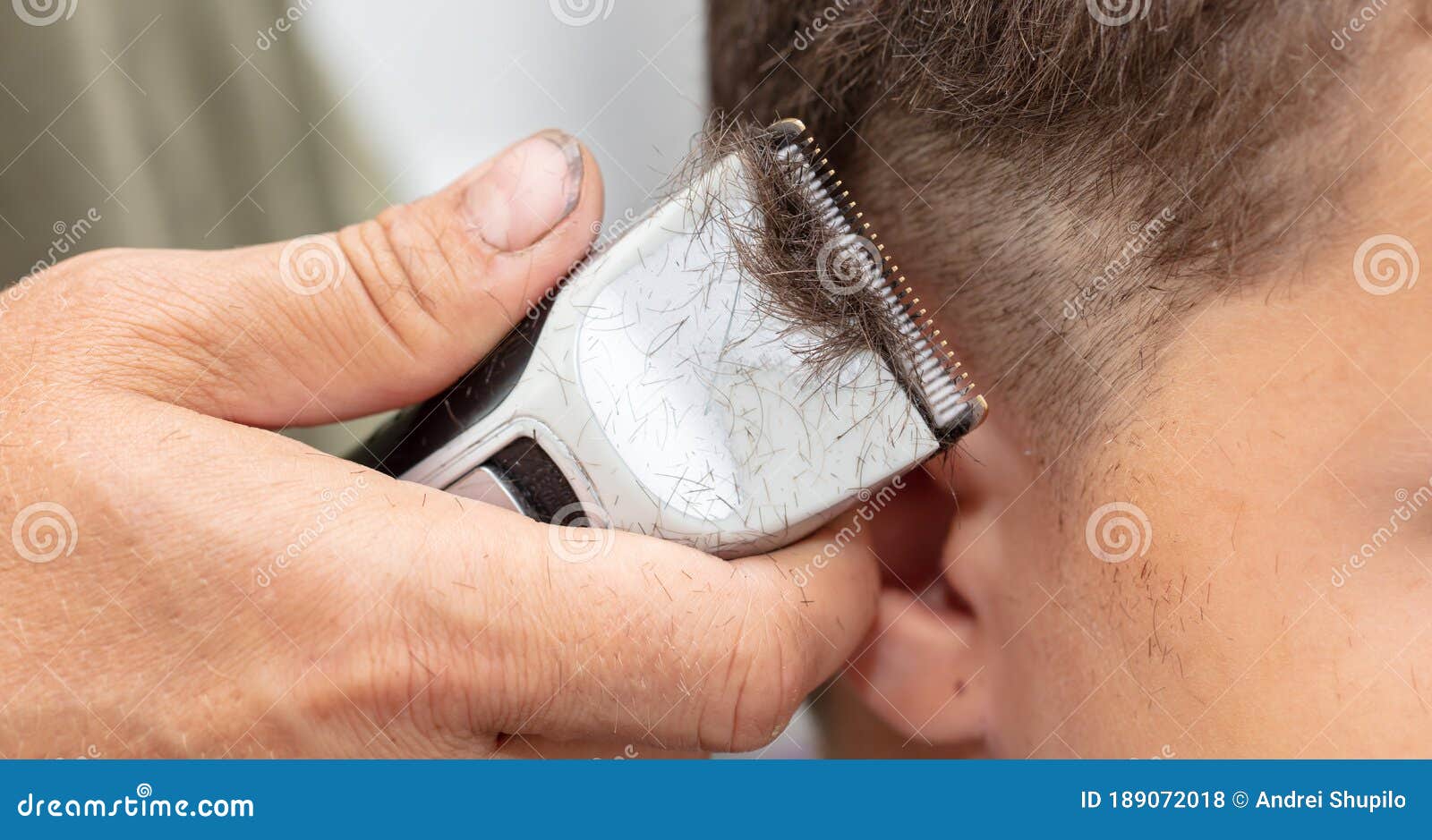 The Boy is Trimmed with a Trimmer Stock Photo - Image of salon, barber ...