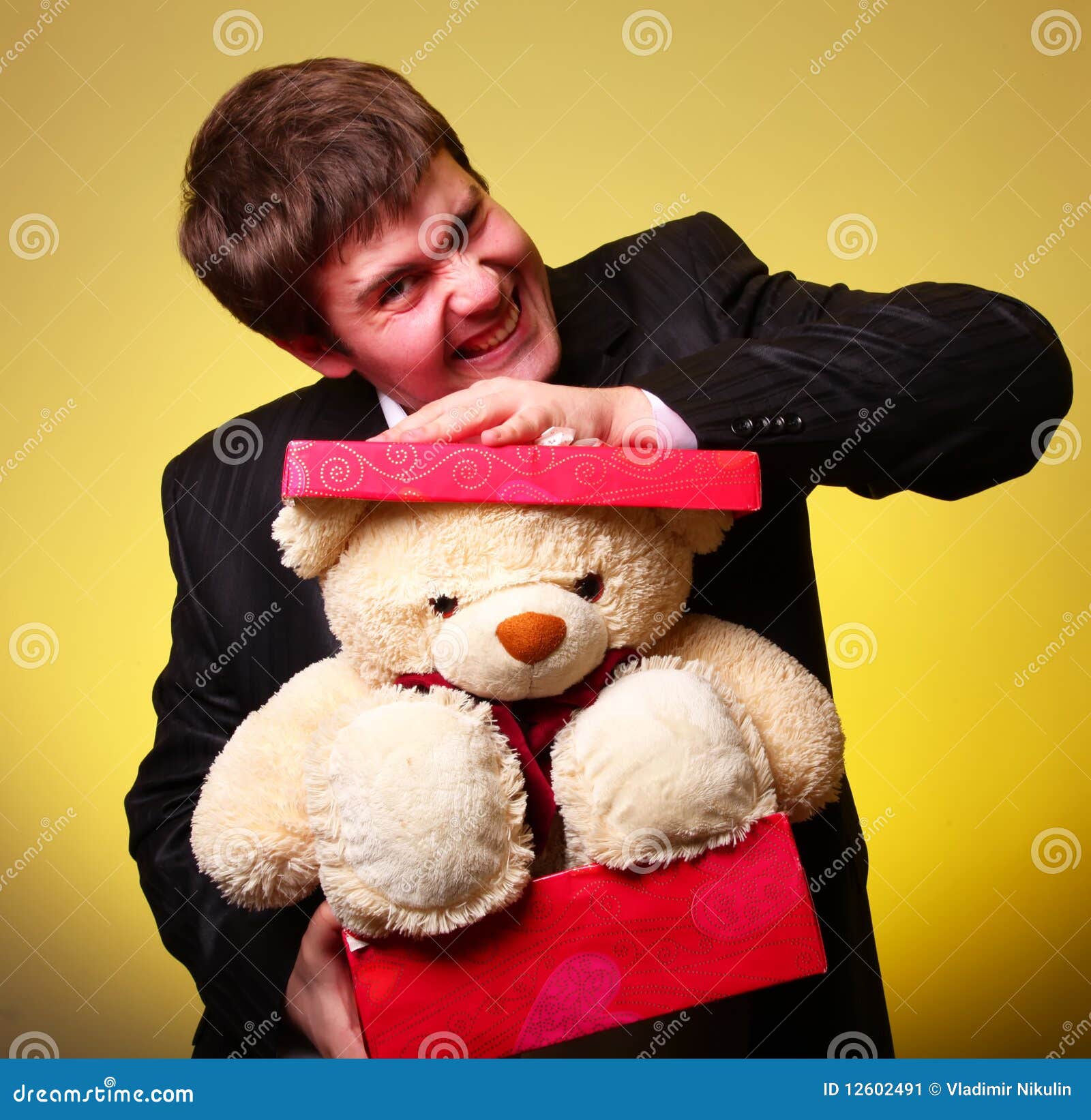 Boy Try To Hide Teddy Bear in Present Box Stock Image - Image of ...