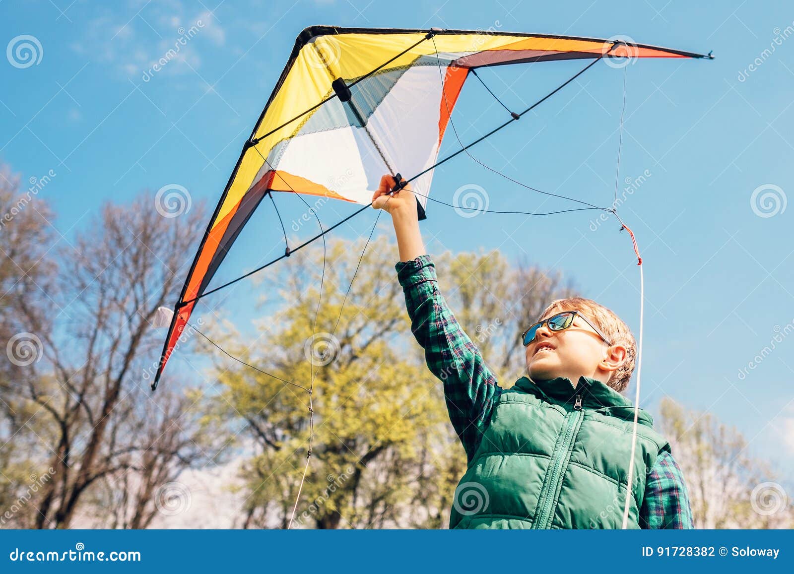 Boy Try To Start Kite in the Sky Stock Photo - Image of child, nature ...