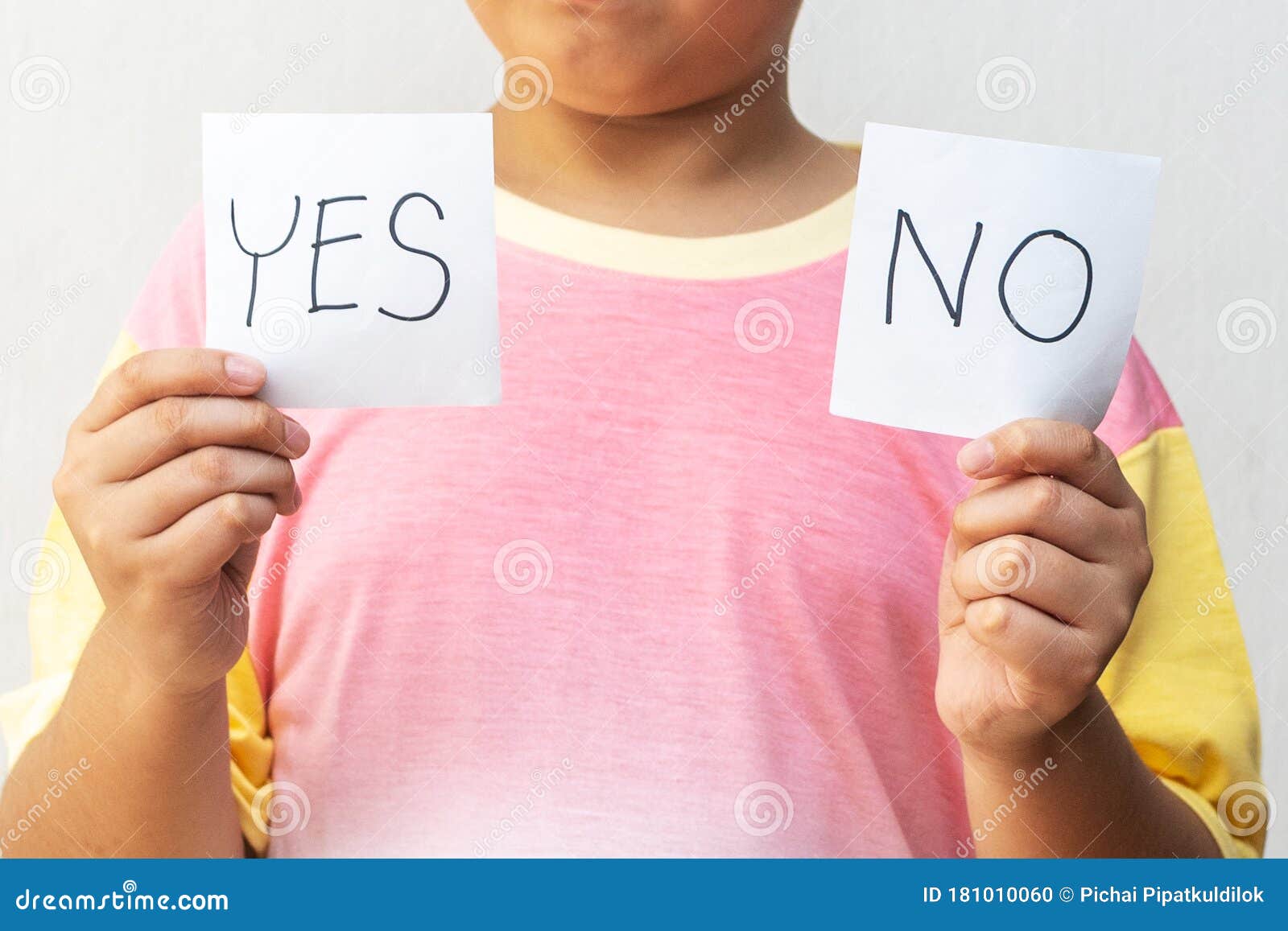 Boy Trying To Make a Decision between Yes or No Choice Stock Photo ...