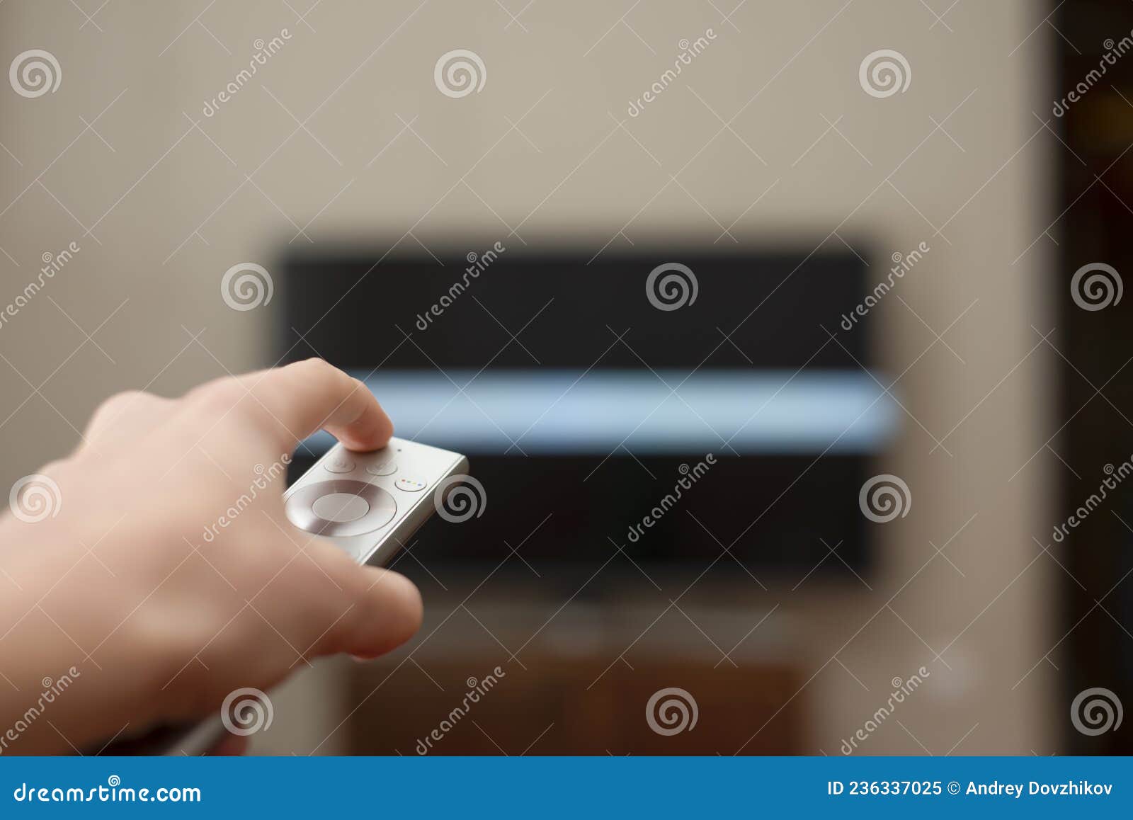 The Boy Turned Off the TV through His Remote Control Stock Image ...