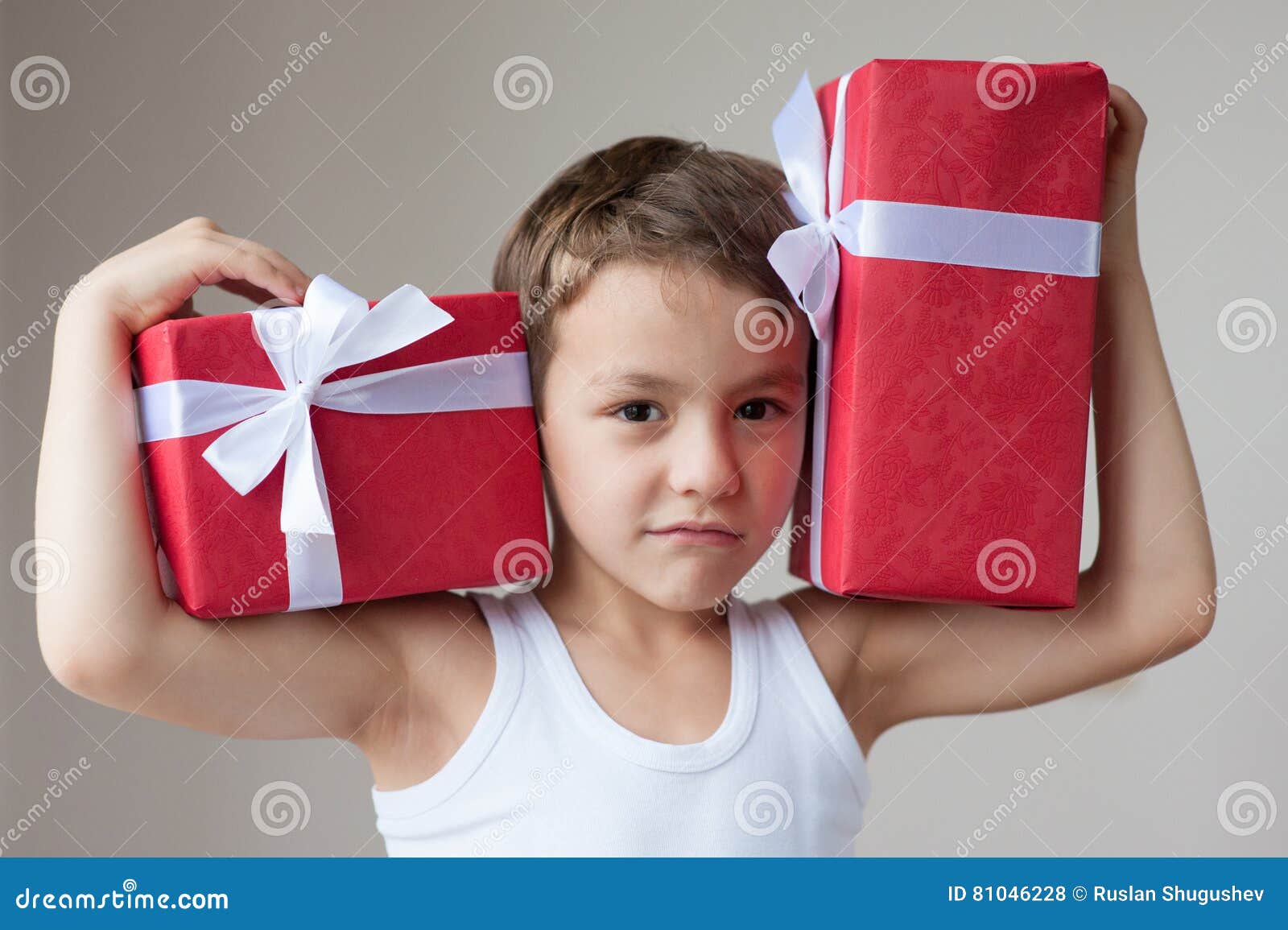 Boy with Two Gifts Show Muscle Stock Photo - Image of bodybuilding ...