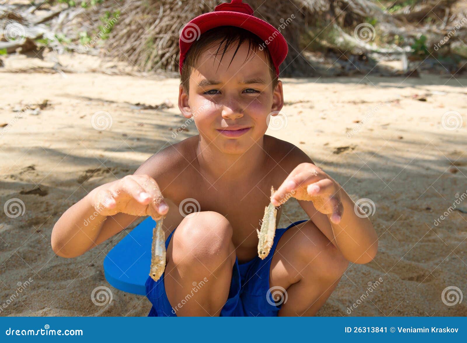 Boy with Two Little Fishies Stock Image - Image of catch, fisherman ...