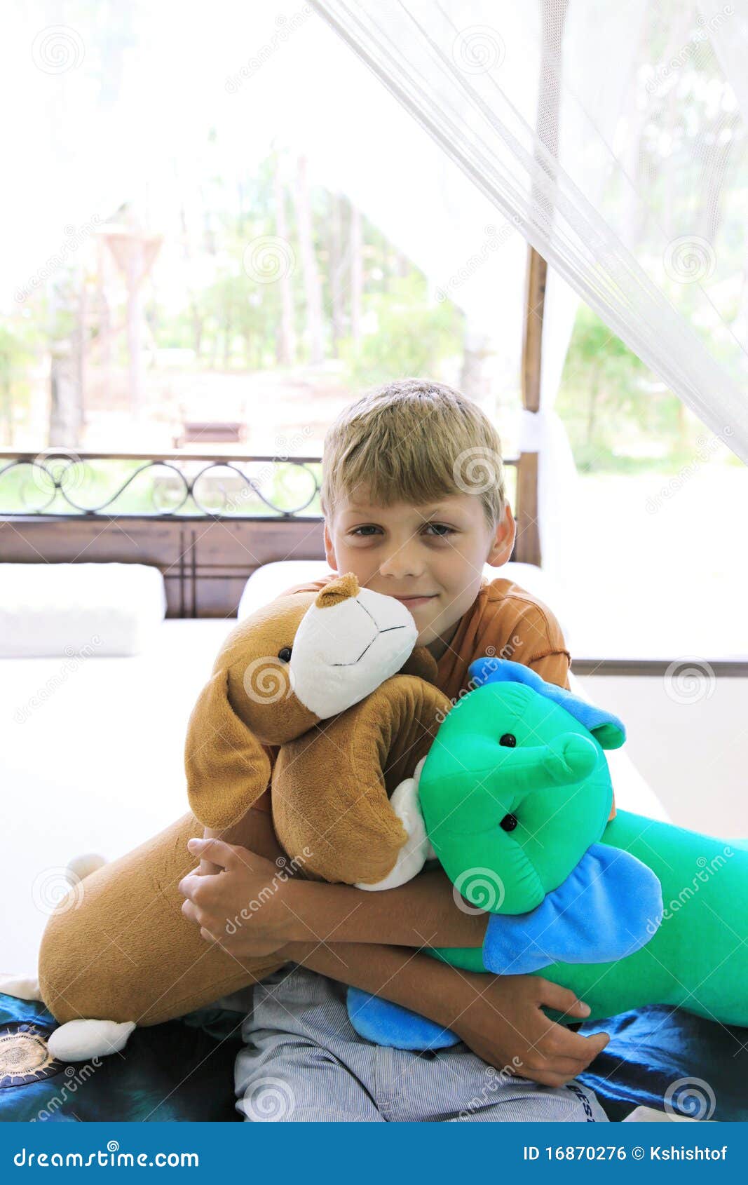Boy with two stuffed toys stock photo. Image of animal - 16870276
