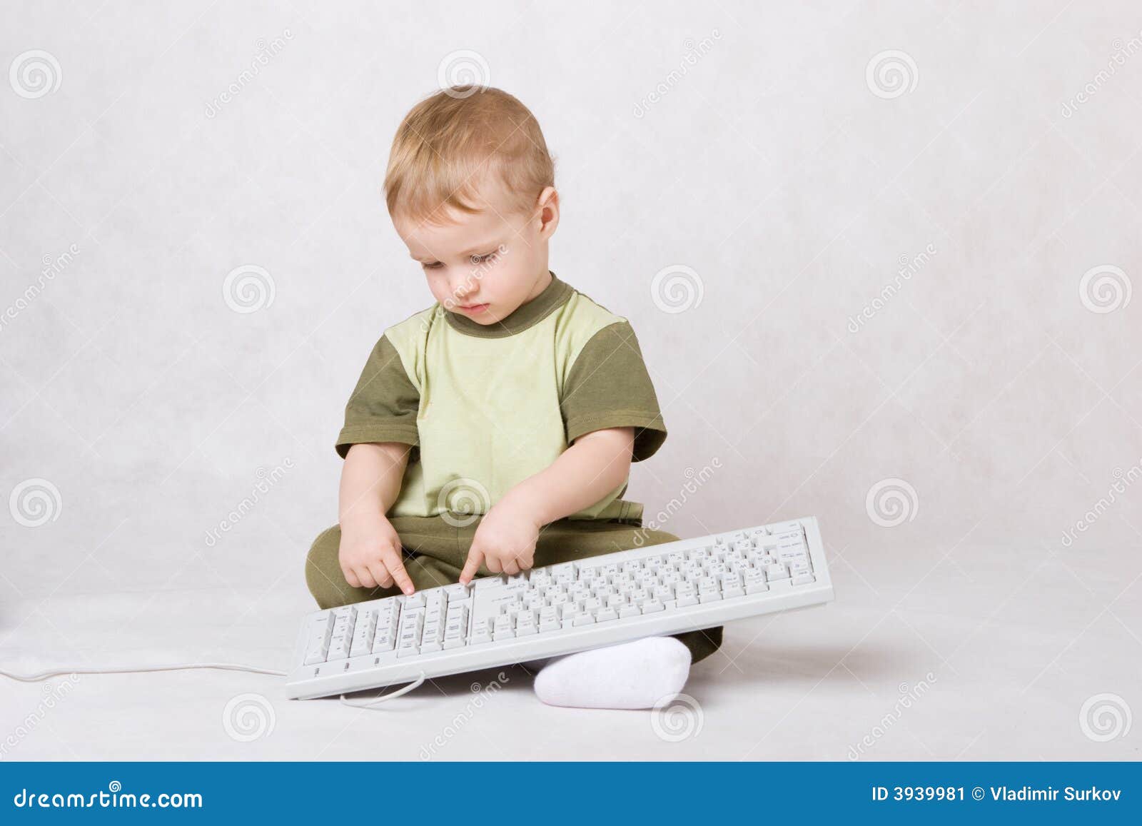 Boy typing on keyboard stock image. Image of internet - 3939981