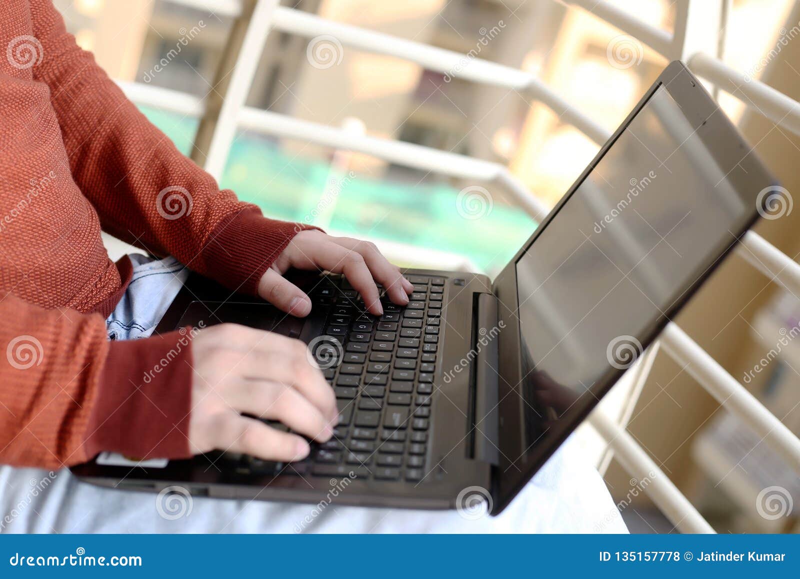 Boy is Typing on the Laptop Stock Photo - Image of dashing, pose: 135157778